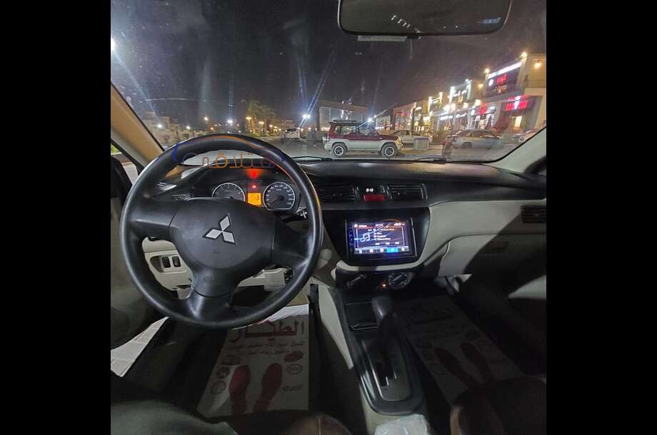 Lancer Puma Mitsubishi 2012 Cairo Silver 6514059 - Car for sale : Hatla2ee