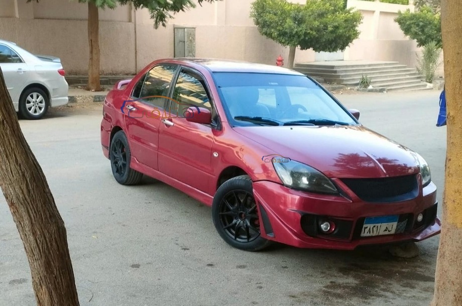 Lancer Mitsubishi 2007 6 October Dark red 6532757 - Car for sale : Hatla2ee