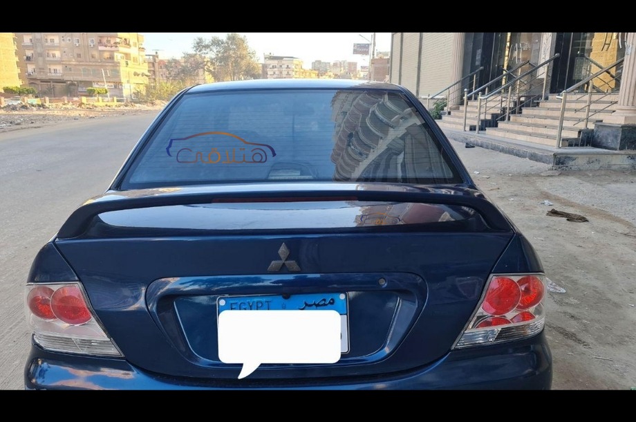 Lancer Puma Mitsubishi 2006 Mansoura Blue 6536343 - Car for sale : Hatla2ee