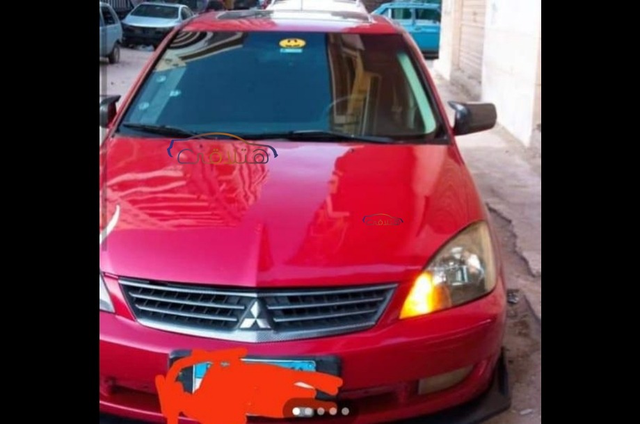 Lancer Puma Mitsubishi 2004 El Marg Red 6541659 - Car for sale : Hatla2ee