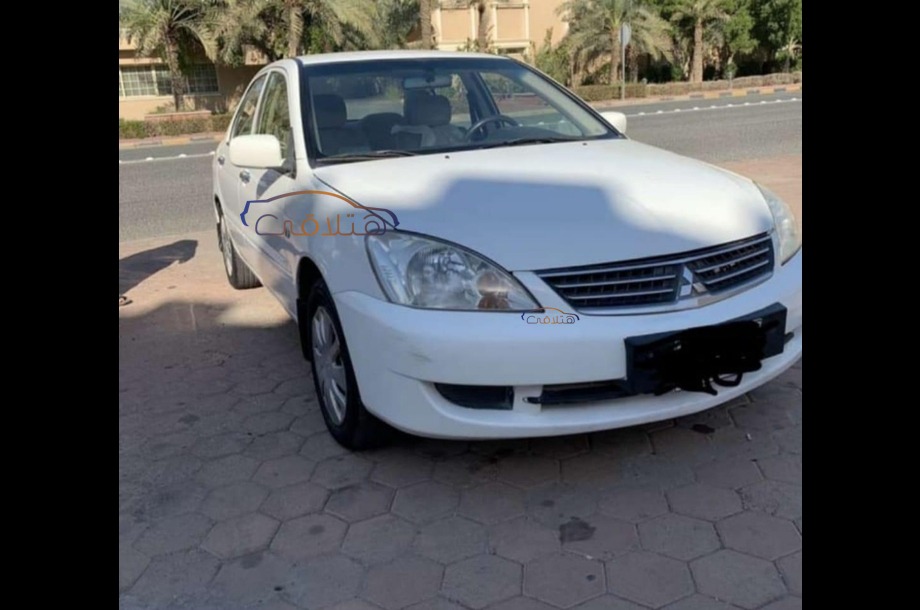 Lancer Puma Mitsubishi 2014 Sohag White 6543000 - Car for sale : Hatla2ee