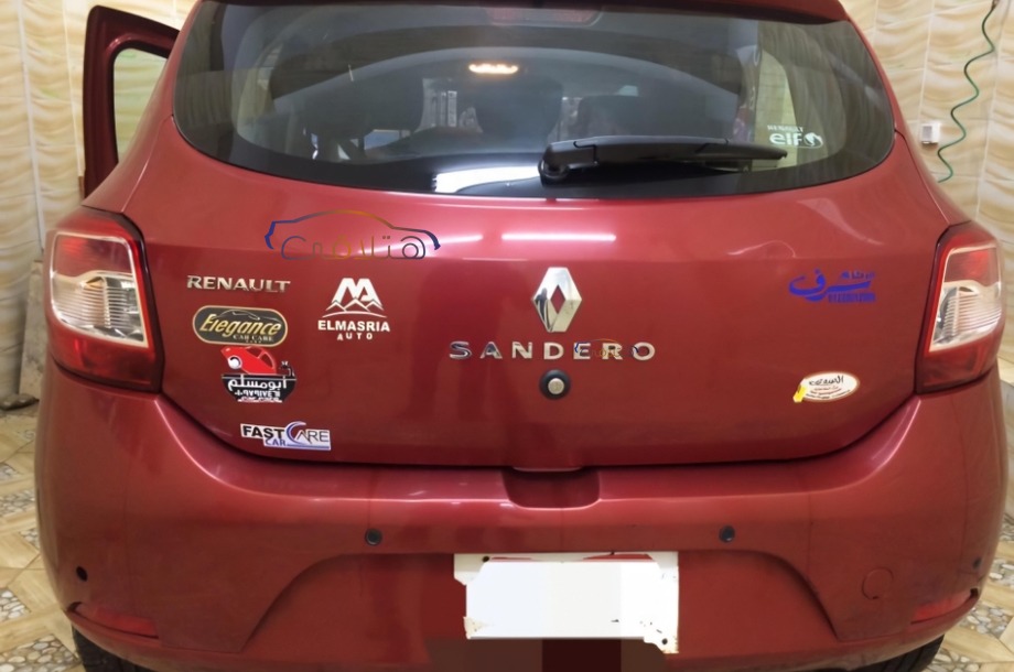 Sandero Renault 2014 Port Said Dark red 6545445 - Car for sale : Hatla2ee