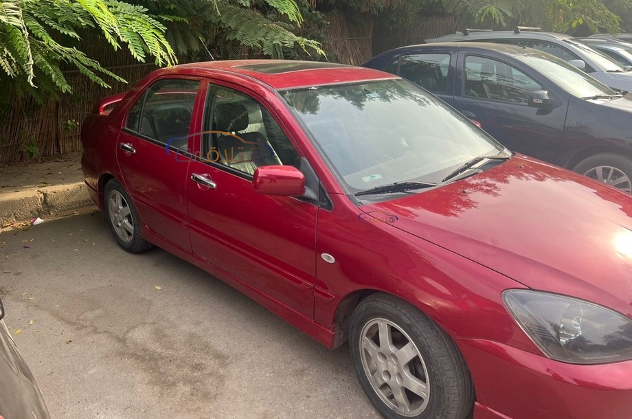 Lancer Puma Mitsubishi 2008 6 October Red 6550793 - Car for sale : Hatla2ee