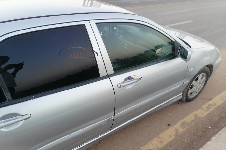 Lancer Puma Mitsubishi 2009 Tanta Silver 6576675 - Car for sale : Hatla2ee