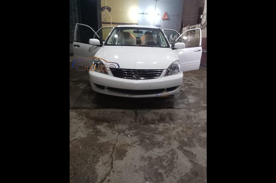 Lancer Puma Mitsubishi 2014 Dakahlia White 6578352 - Car for sale ...