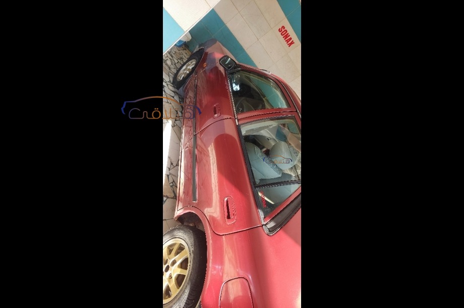 Corolla Toyota 1999 El Bagour Dark red 6579924 - Car for sale : Hatla2ee