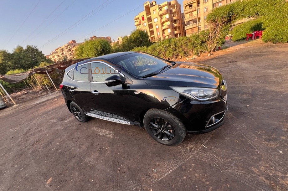 IX 35 Hyundai 2015 Pyramids Gardens Black 6580784 - Car for sale : Hatla2ee