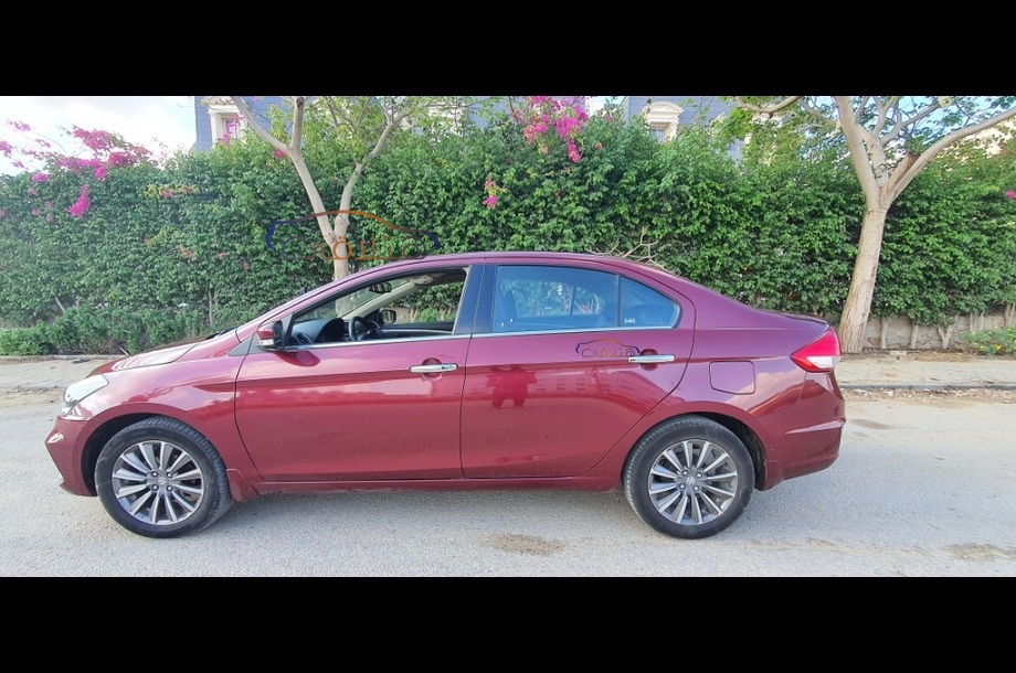 Ciaz Suzuki 2022 Maadi Dark red 6582548 - Car for sale : Hatla2ee