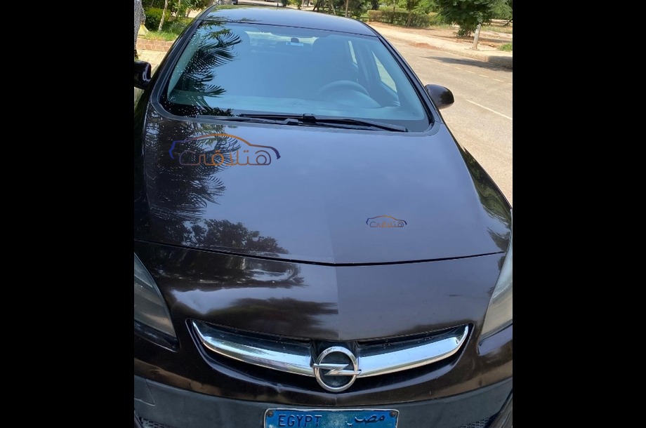 Astra Opel 2014 Cairo Dark red 6587015 - Car for sale : Hatla2ee