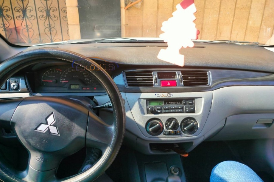 Lancer Puma Mitsubishi 2010 10th of Ramadan White 6593112 - Car for ...