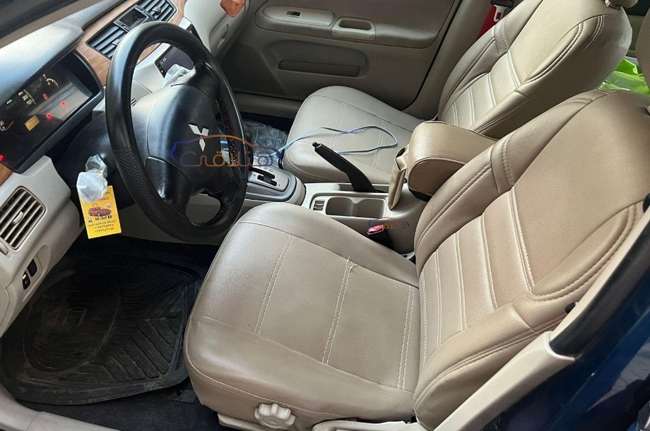 Lancer Puma Mitsubishi 2010 El Haram Blue 6597116 - Car for sale : Hatla2ee