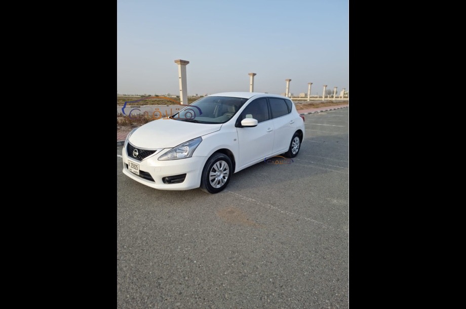 Tiida Nissan 2014 Ajman White 6613503 - Car for sale : Hatla2ee