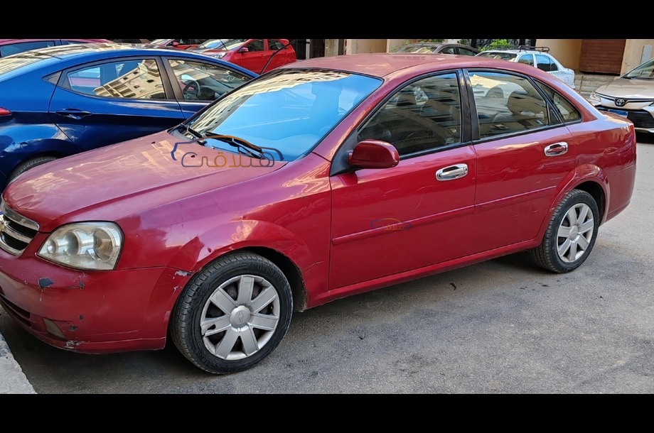 Optra Chevrolet 2012 Mokattam Red 6616946 - Car for sale : Hatla2ee