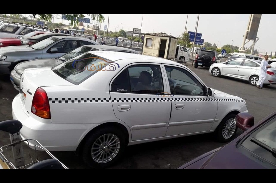 Verna Hyundai 2013 Mohandessin White 6618266 - Car for sale : Hatla2ee