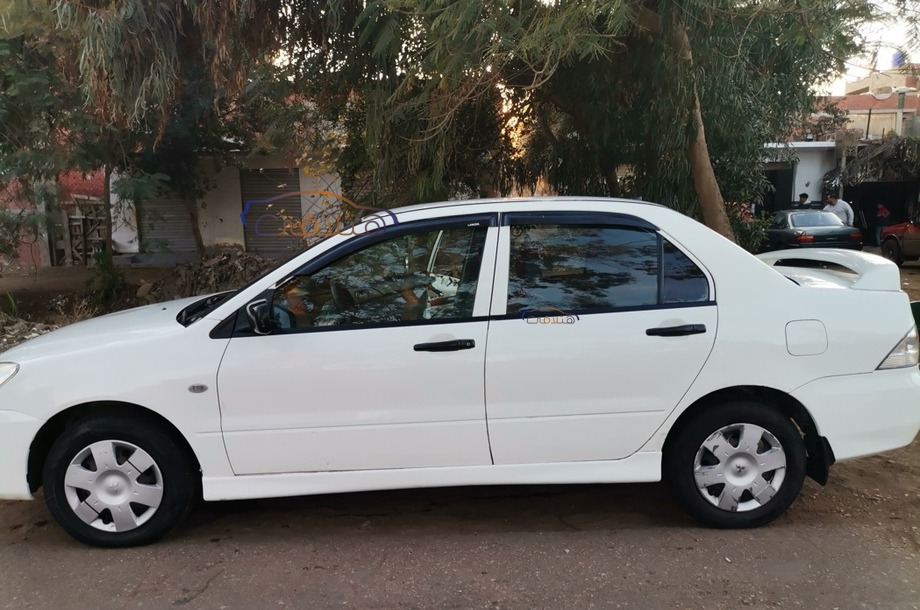 Lancer Puma Mitsubishi 2012 Mansoura White 6620739 - Car for sale ...