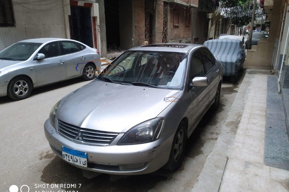 Lancer Puma Mitsubishi 2007 Asyut Silver 6624801 - Car for sale : Hatla2ee