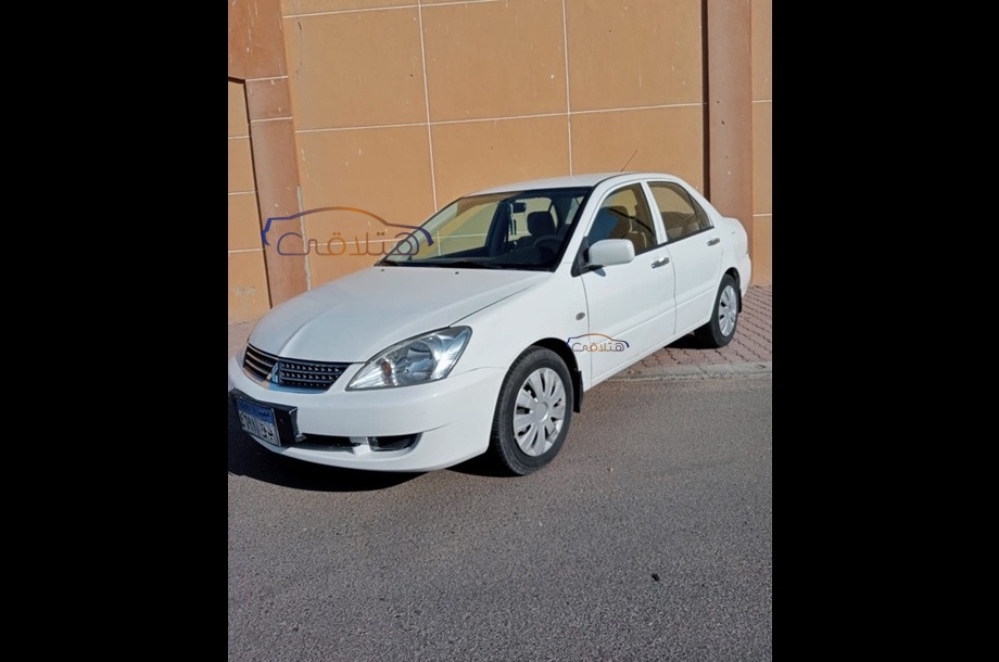 Lancer Puma Mitsubishi 2014 Safaga White 6625125 - Car for sale : Hatla2ee