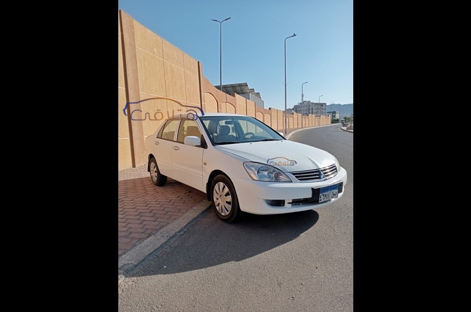 Lancer Puma Mitsubishi 2014 Safaga White 6625125 - Car for sale : Hatla2ee