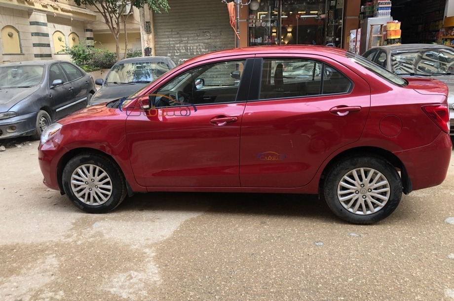 Swift Dzire Suzuki 2022 Maadi Red 6626706 - Car for sale : Hatla2ee