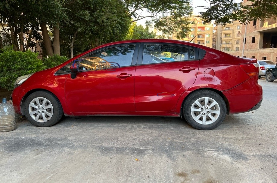 Rio Kia 2014 Mokattam Red 6631468 - Car for sale : Hatla2ee