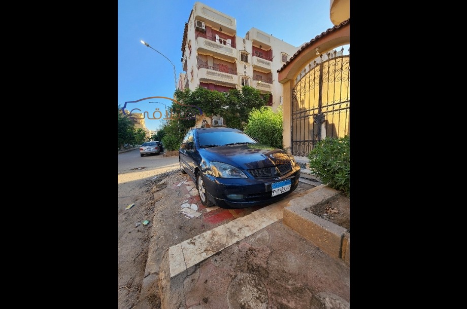 Lancer Puma Mitsubishi 2009 Helwan Dark blue 6632177 - Car for sale ...