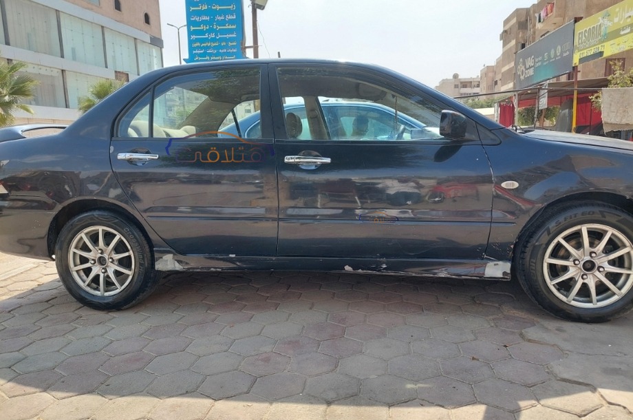 Lancer Puma Mitsubishi 2007 Cairo Black 6633385 - Car for sale : Hatla2ee