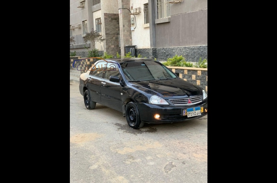Lancer Puma Mitsubishi 2009 Tagamo3 - New Cairo Black 6650881 - Car for ...