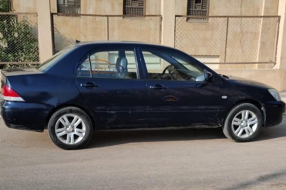 Lancer Puma Mitsubishi 2013 Maadi Blue 6655180 - Car for sale : Hatla2ee