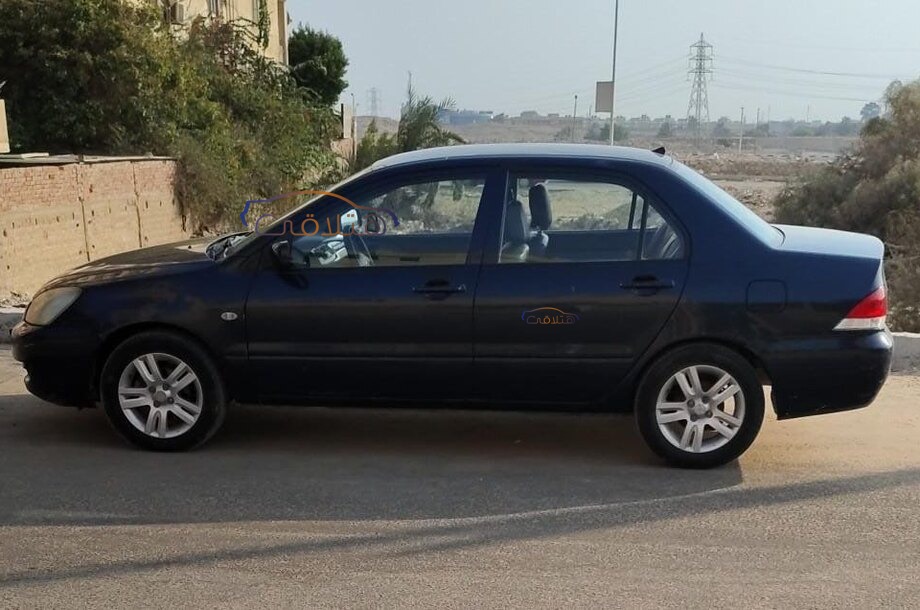 Lancer Puma Mitsubishi 2013 Maadi Blue 6655180 - Car for sale : Hatla2ee