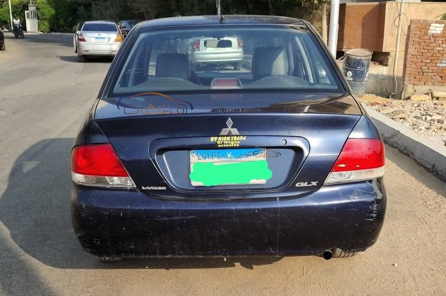 Lancer Puma Mitsubishi 2013 Maadi Blue 6655180 - Car for sale : Hatla2ee