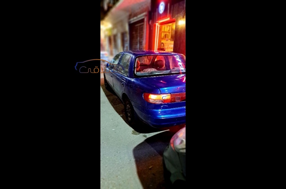 Sephia Kia 1995 Asyut Dark blue 6655501 - Car for sale : Hatla2ee