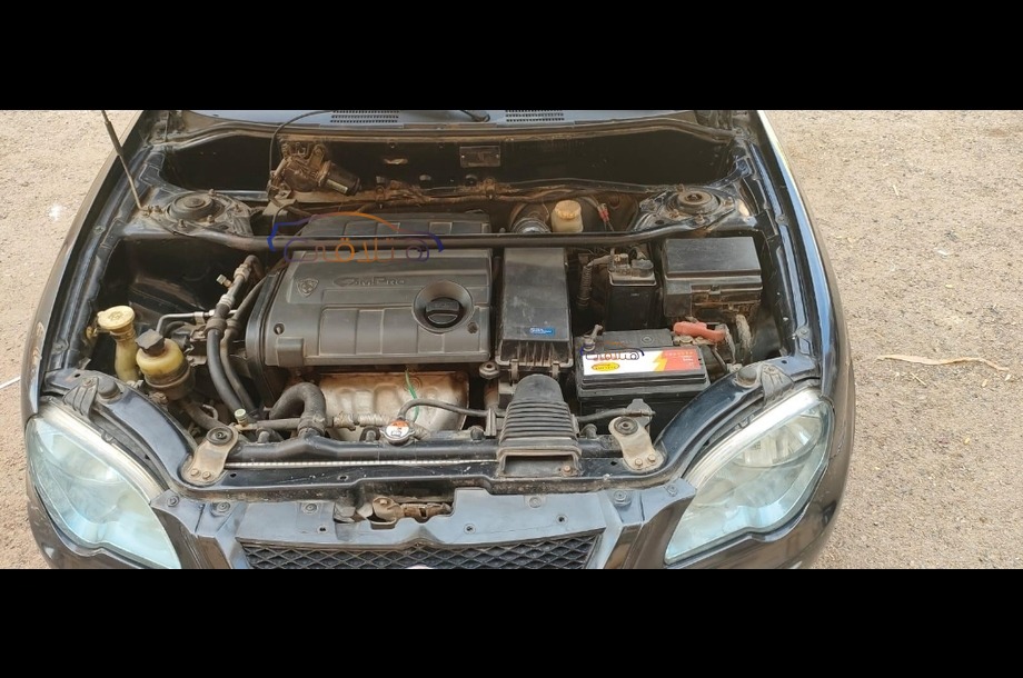 Gen 2 Proton 2010 Red Sea Black 6656878 - Car for sale : Hatla2ee