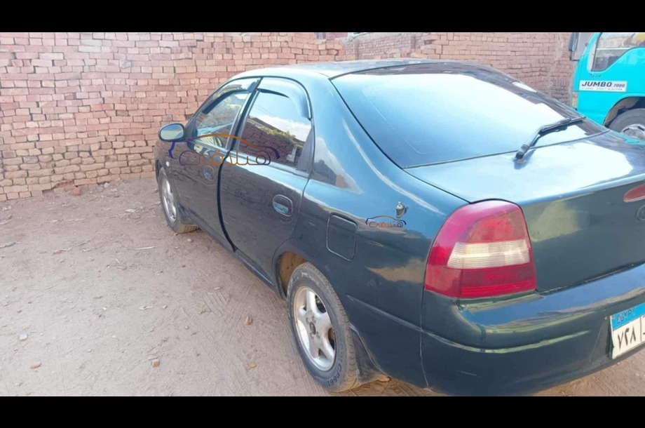 Shuma Kia 1999 Cairo Dark green 6657974 - Car for sale : Hatla2ee