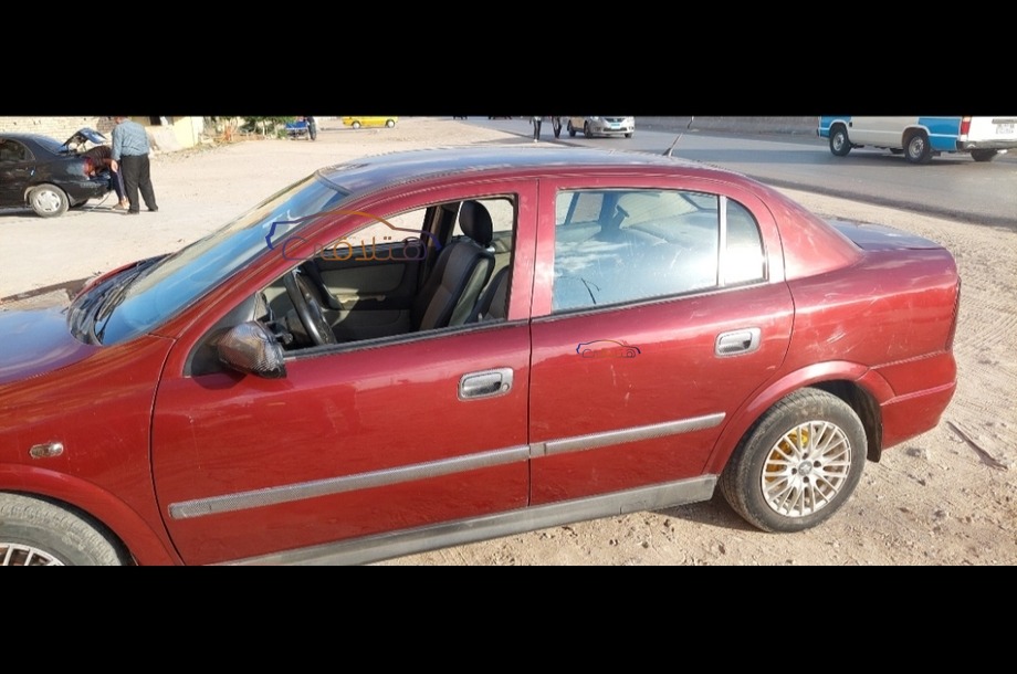Astra Opel 2000 Alexandria Dark red 6665322 - Car for sale : Hatla2ee