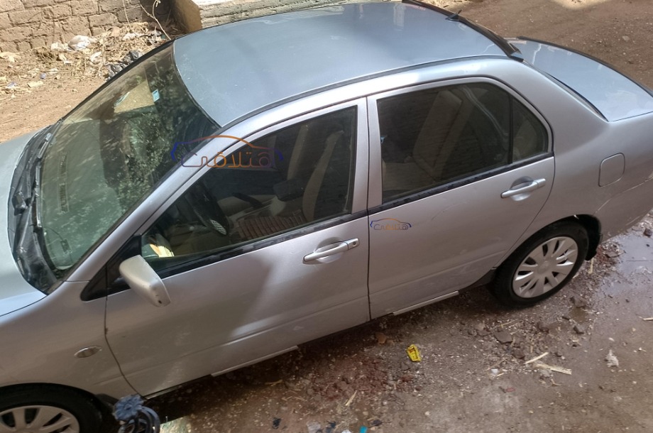 Lancer Puma Mitsubishi 2008 Sohag Silver 6670924 - Car for sale : Hatla2ee