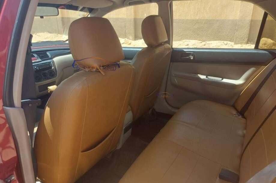 Lancer Puma Mitsubishi 2010 Nasr city Dark red 6677134 - Car for sale ...