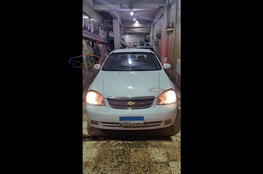 Optra Chevrolet 2014 Alexandria White 6683575 - Car for sale : Hatla2ee