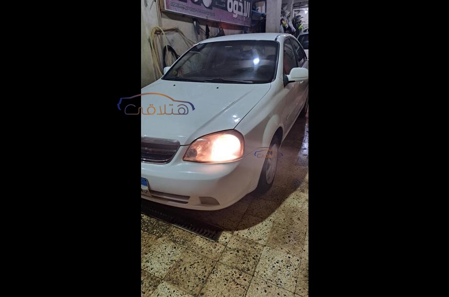 Optra Chevrolet 2014 Alexandria White 6683575 - Car for sale : Hatla2ee