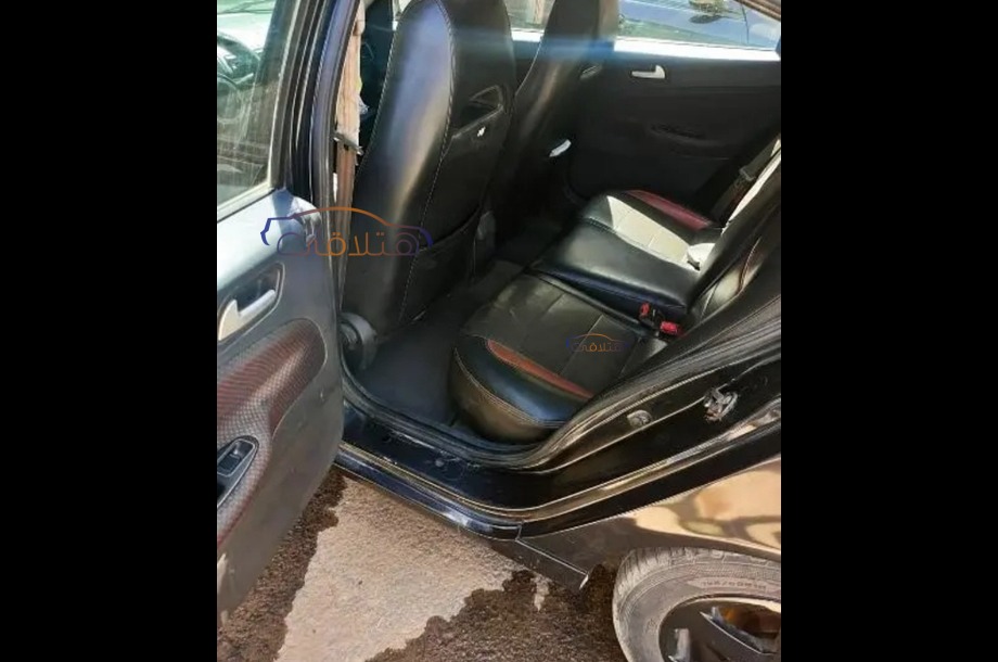 Gen 2 Proton 2010 6 October Black 6687425 - Car for sale : Hatla2ee