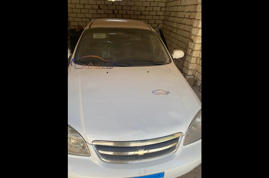 Optra Chevrolet 2014 Borg el arab White 6688028 - Car for sale : Hatla2ee