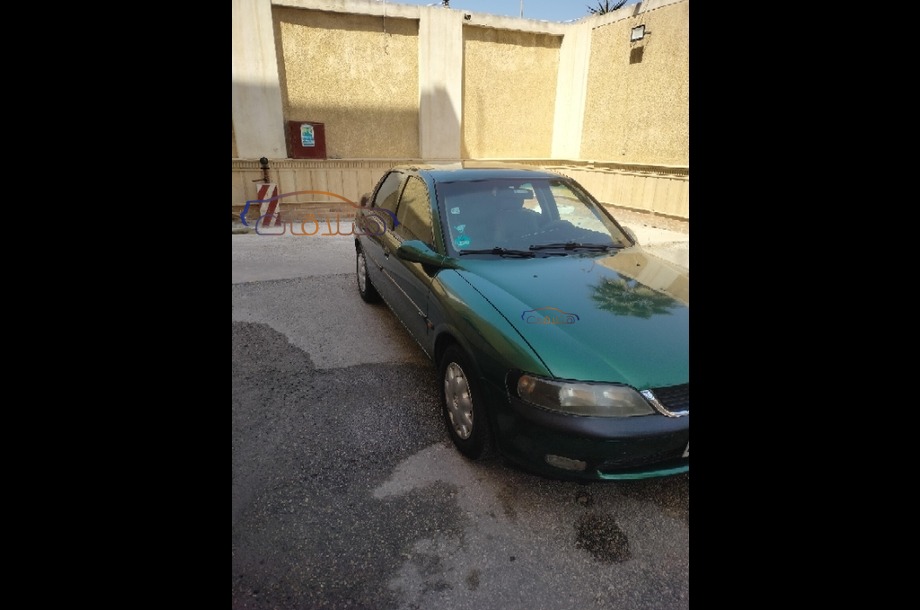 Vectra Opel 1996 Damietta Dark green 6690317 - Car for sale : Hatla2ee