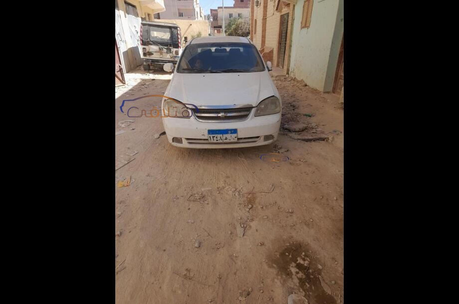 Optra Chevrolet 2014 Borg el arab White 6691412 - Car for sale : Hatla2ee