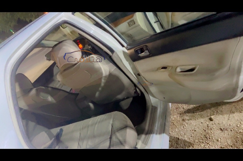 Lancer Puma Mitsubishi 2014 Sohag White 6691808 - Car for sale : Hatla2ee
