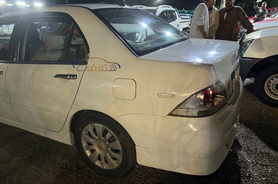 Lancer Puma Mitsubishi 2014 Sohag White 6691808 - Car for sale : Hatla2ee