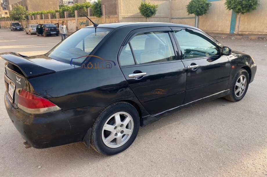 Lancer Puma Mitsubishi 2007 Cairo Black 6692431 - Car for sale : Hatla2ee