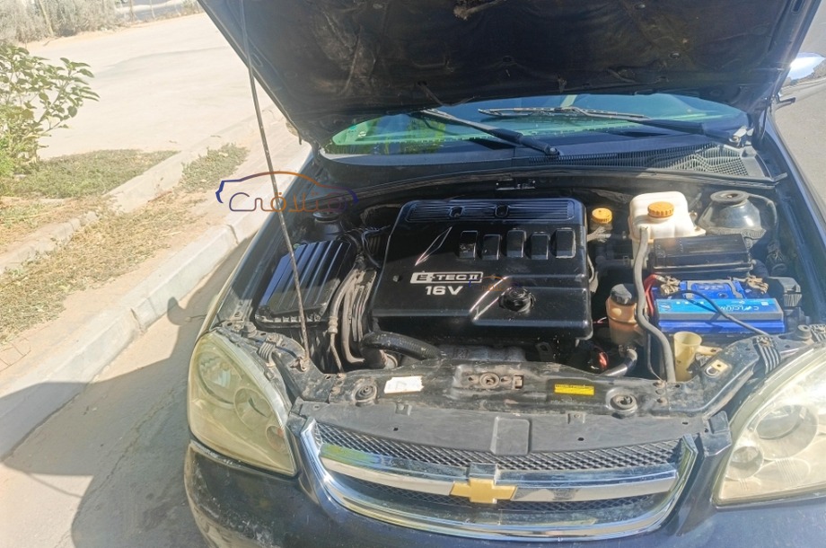 Optra Chevrolet 2010 Mokattam Black 6698954 - Car for sale : Hatla2ee