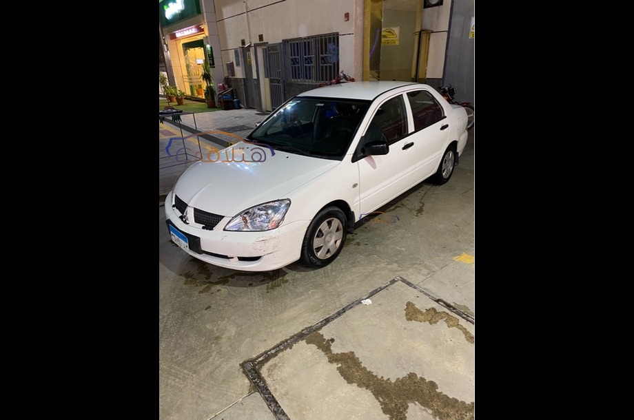 Lancer Puma Mitsubishi 2007 Monufia White 6700295 - Car for sale : Hatla2ee