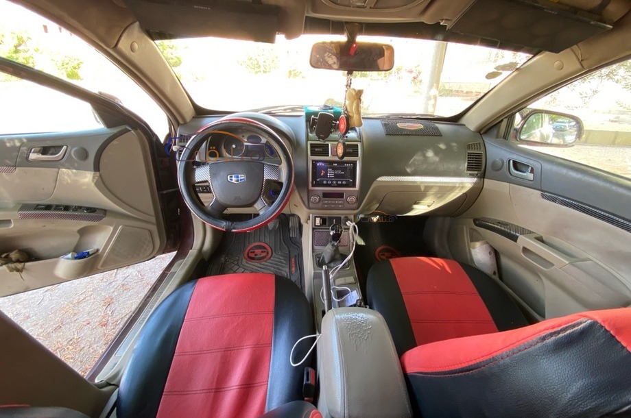 EC 7 Emgrand 2015 Qalyub Dark red 6707183 - Car for sale : Hatla2ee