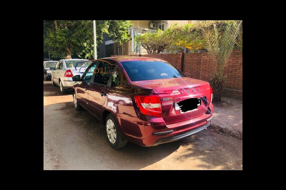Granta Lada 2022 Heliopolis Dark red 6709999 - Car for sale : Hatla2ee