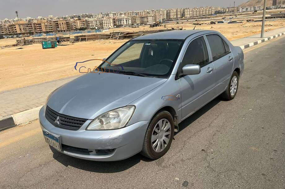 Lancer Puma Mitsubishi 2013 Cairo Silver 6711206 - Car for sale : Hatla2ee